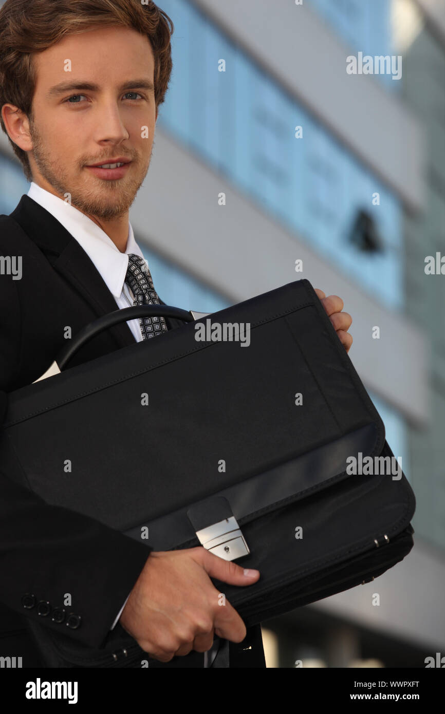 Portrait of a young salesman Stock Photo - Alamy