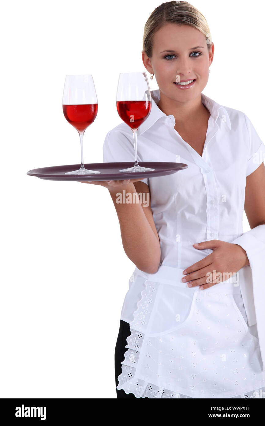 Blonde waitress with a tray Stock Photo - Alamy