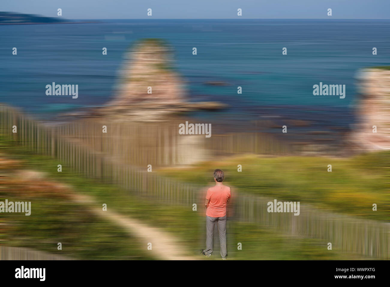 Man enjoying the landscape on the French Basque coast, Hendaia - France ...
