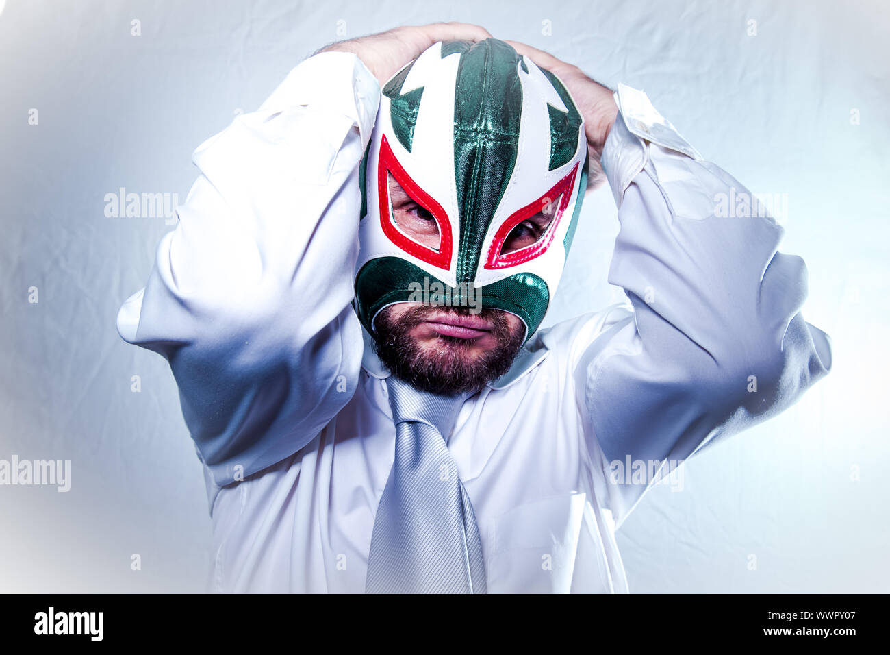 Angry businessman mexican wrestler mask hi-res stock photography and ...