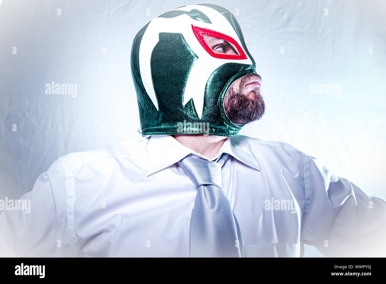 Crazy, angry businessman with Mexican wrestler mask, expressions of ...