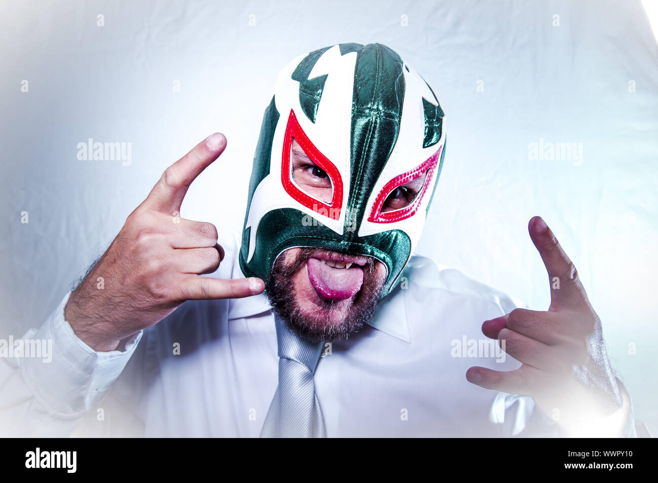 Bad, angry businessman with Mexican wrestler mask, expressions of anger ...