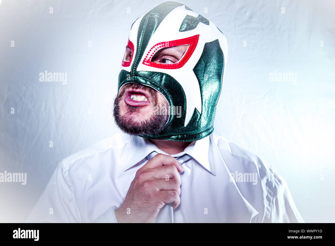 Manager, angry businessman with Mexican wrestler mask, expressions of ...