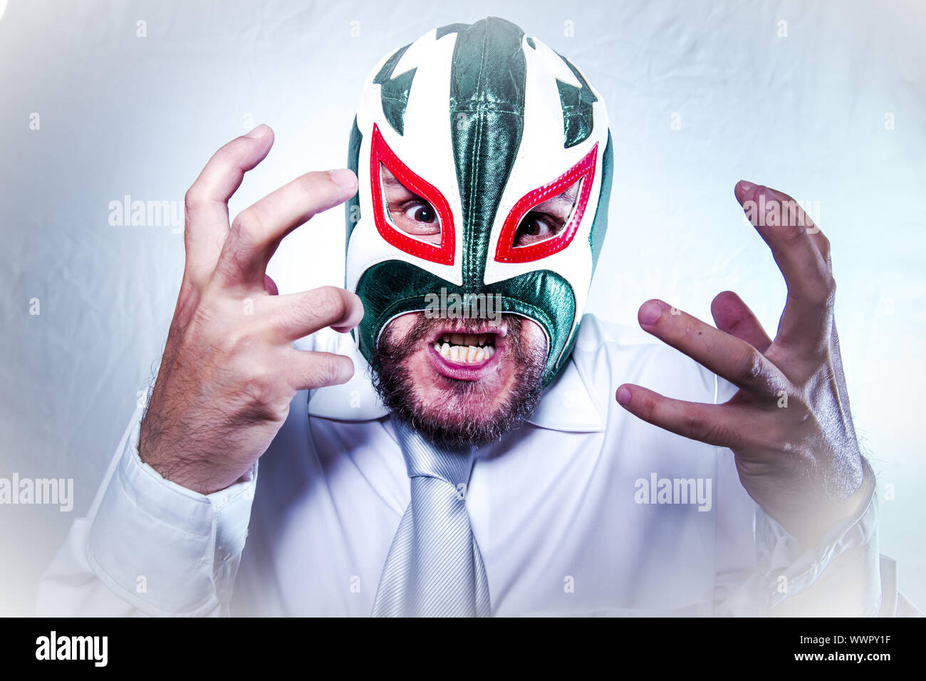 angry businessman with Mexican wrestler mask, expressions of anger and ...
