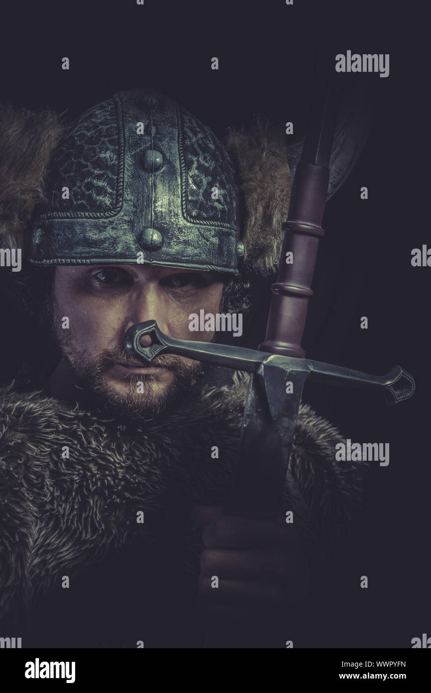 Leadership, Costume, Viking warrior with a huge sword and helmet with ...