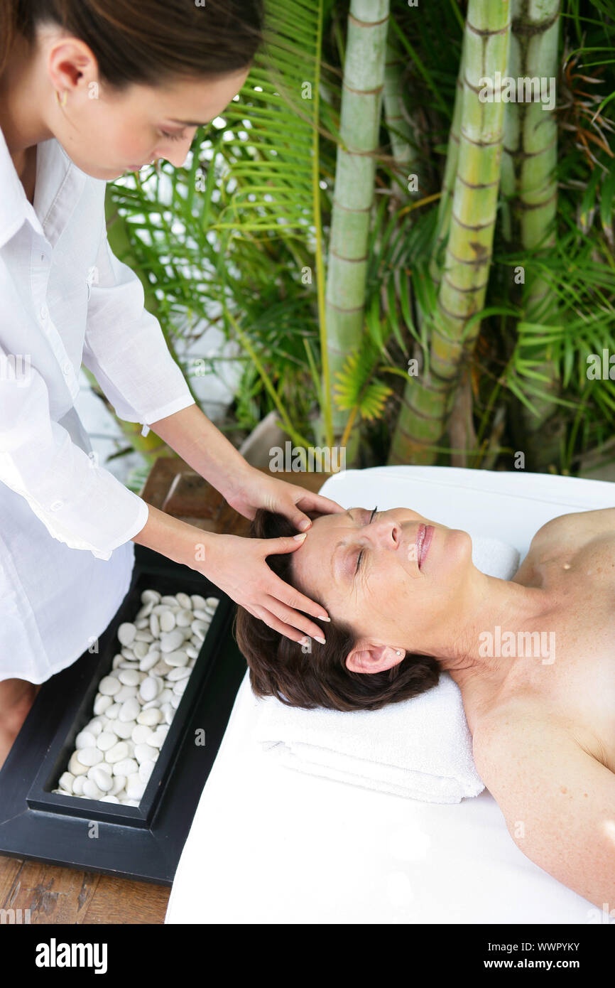 senior woman having a massage in a spa center Stock Photo - Alamy