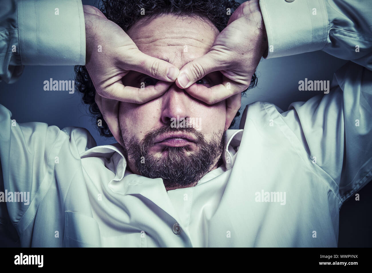 imagination and madness, man with intense expression, white shirt Stock ...