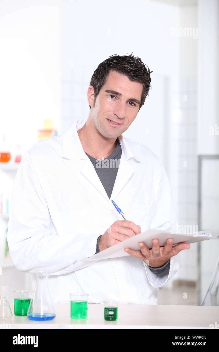 Close up portrait scientist writing hi-res stock photography and images ...