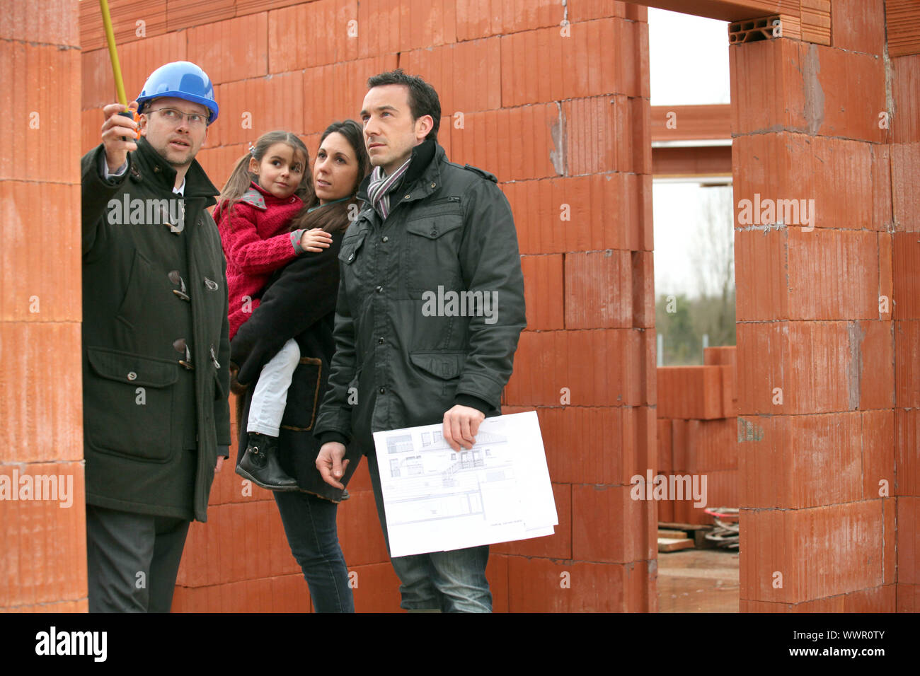 Family having their new home inspected by an engineer Stock Photo - Alamy