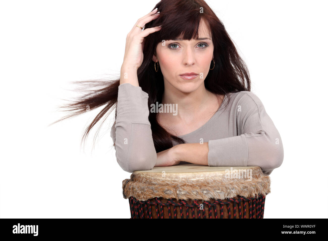beautiful woman playing on traditional drums Stock Photo - Alamy