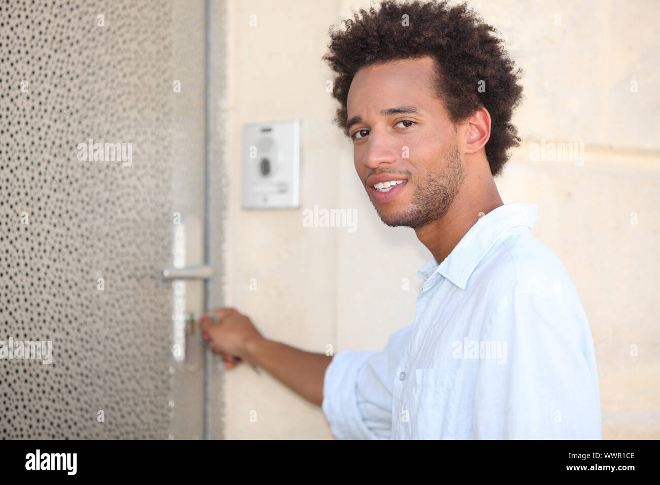 Home door padlock man hi-res stock photography and images - Alamy