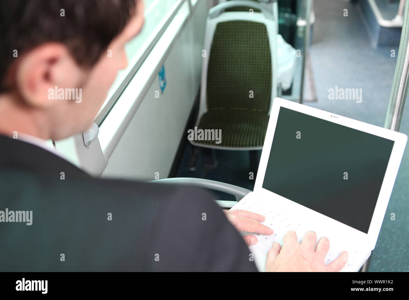 Man working on the bus Stock Photo - Alamy