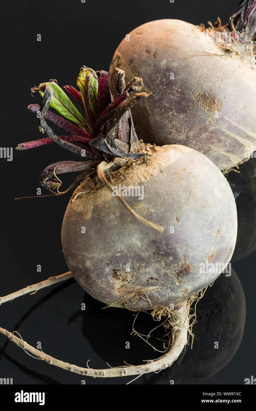 Three farm fresh raw beetroot Stock Photo - Alamy