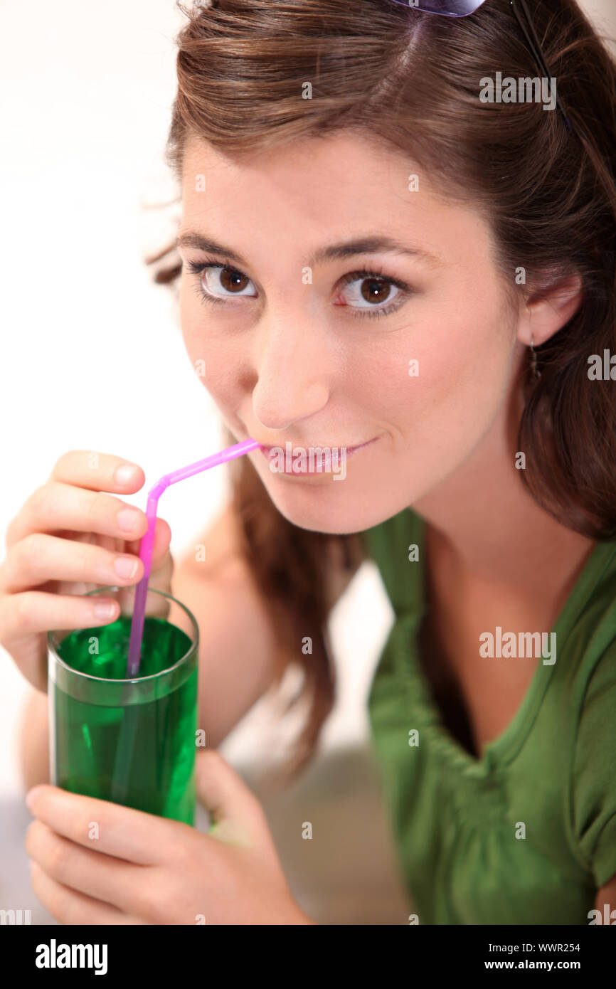 Woman with a glass of mint squash Stock Photo - Alamy