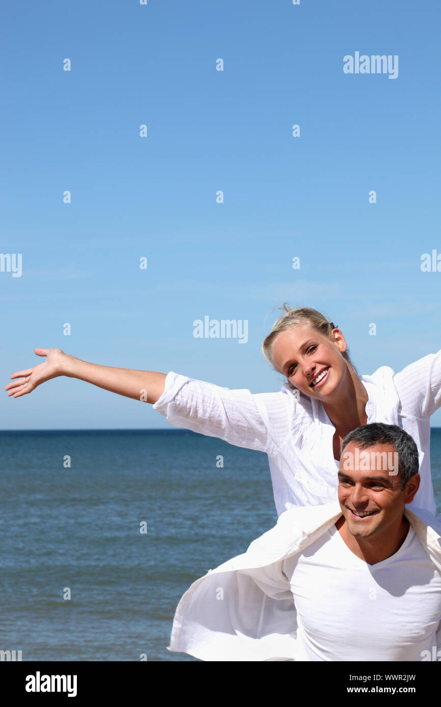 Couple by the sea Stock Photo - Alamy