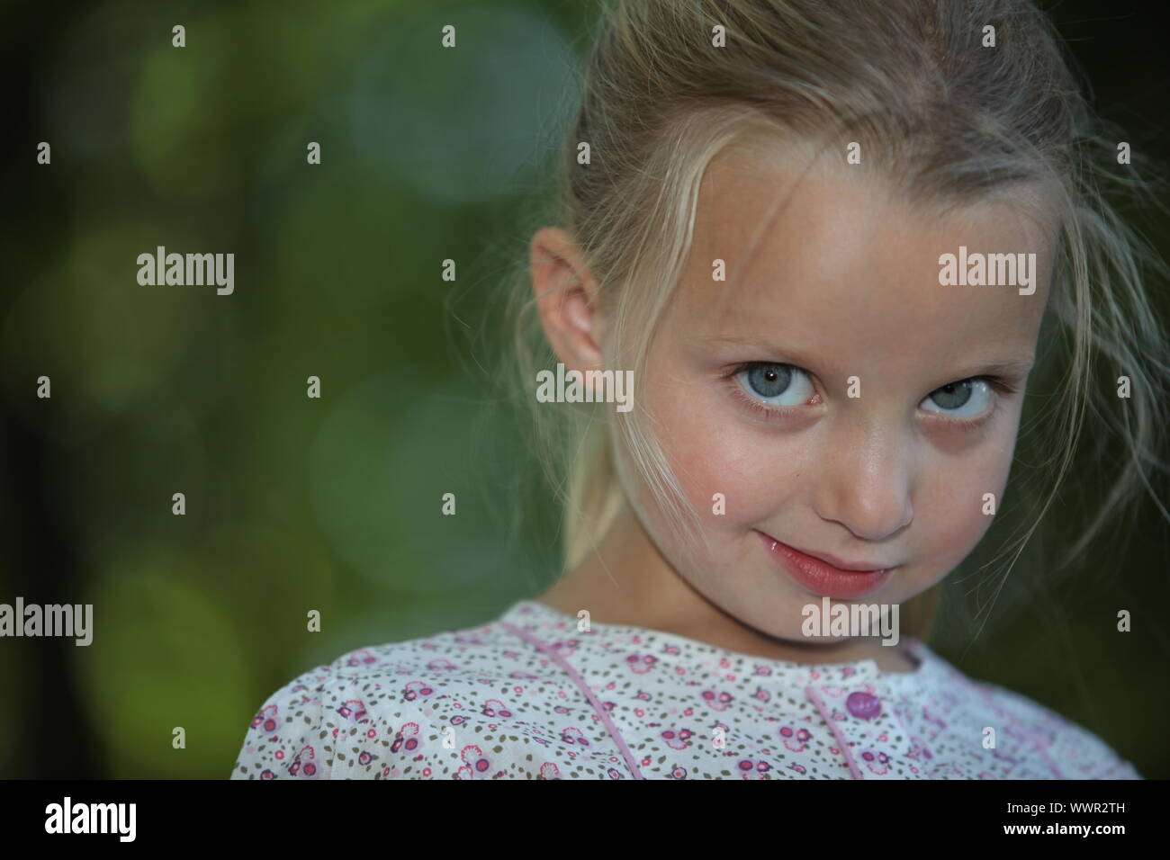 shy blonde little girl Stock Photo - Alamy