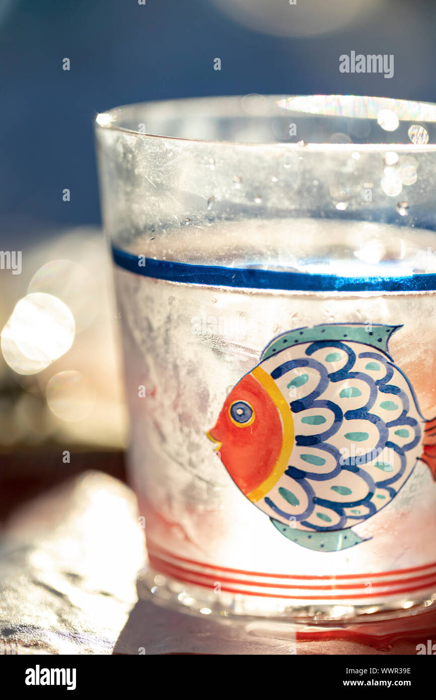 goldfish in cocktail drink glass and water showing bar flee free or ...