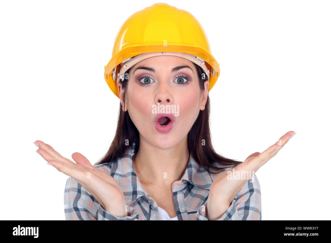 Shocked female construction worker Stock Photo - Alamy