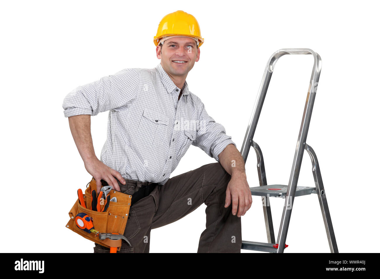 Man climbing ladder building repair Cut Out Stock Images & Pictures - Alamy