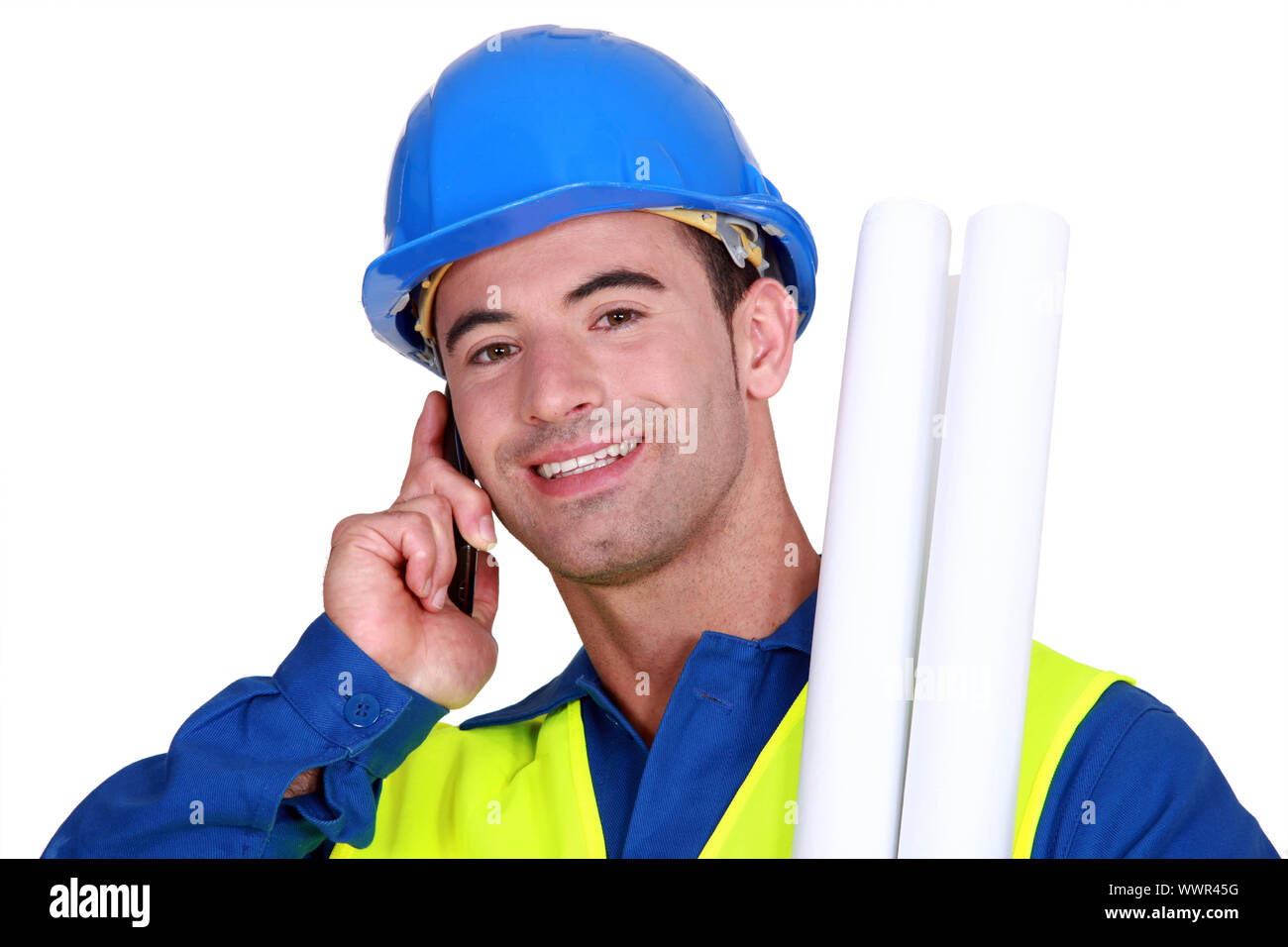 Construction worker talking on the phone Stock Photo - Alamy
