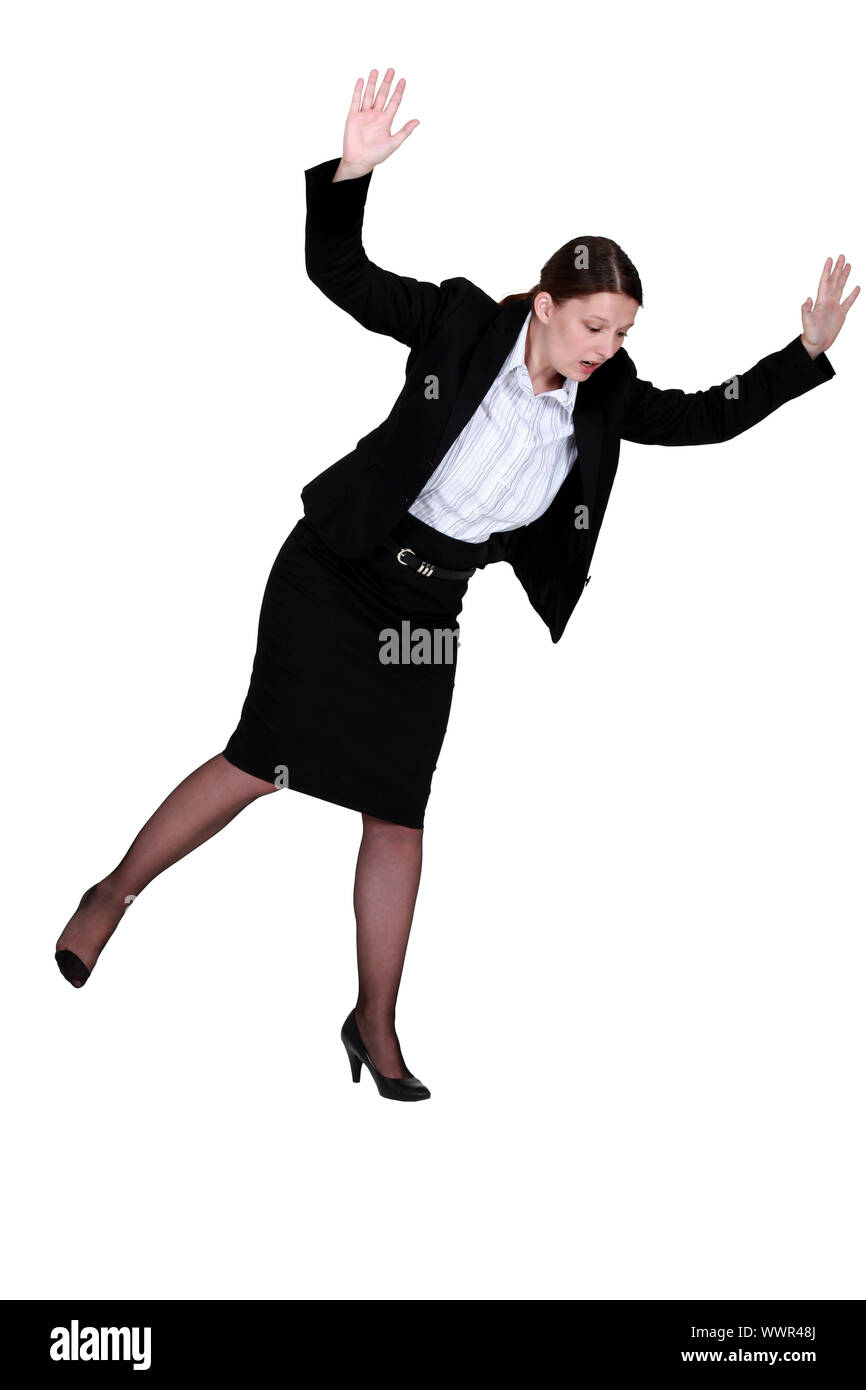 Woman slipping on the floor Stock Photo - Alamy