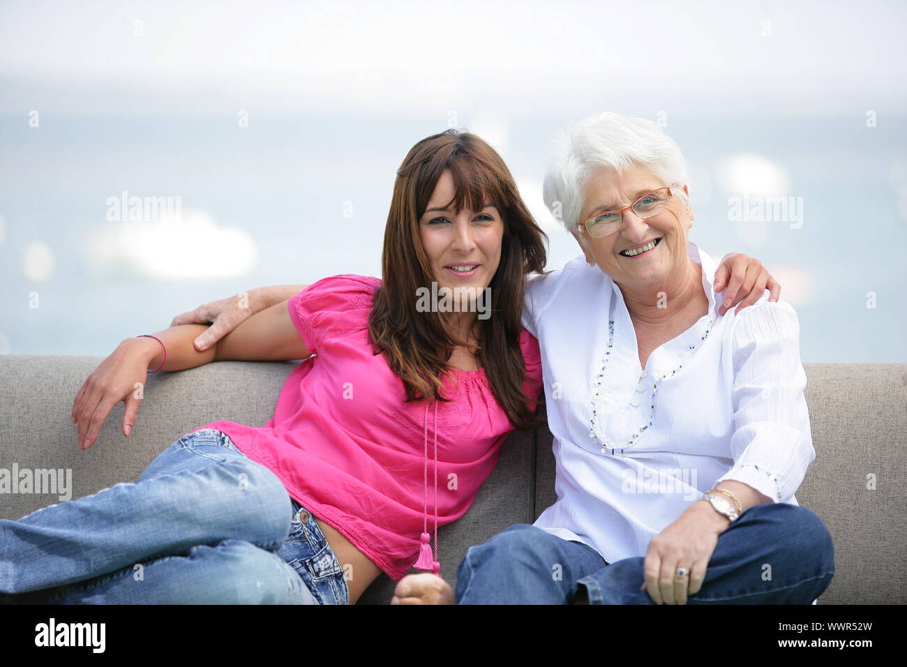 Young woman spending time with grandma Stock Photo - Alamy