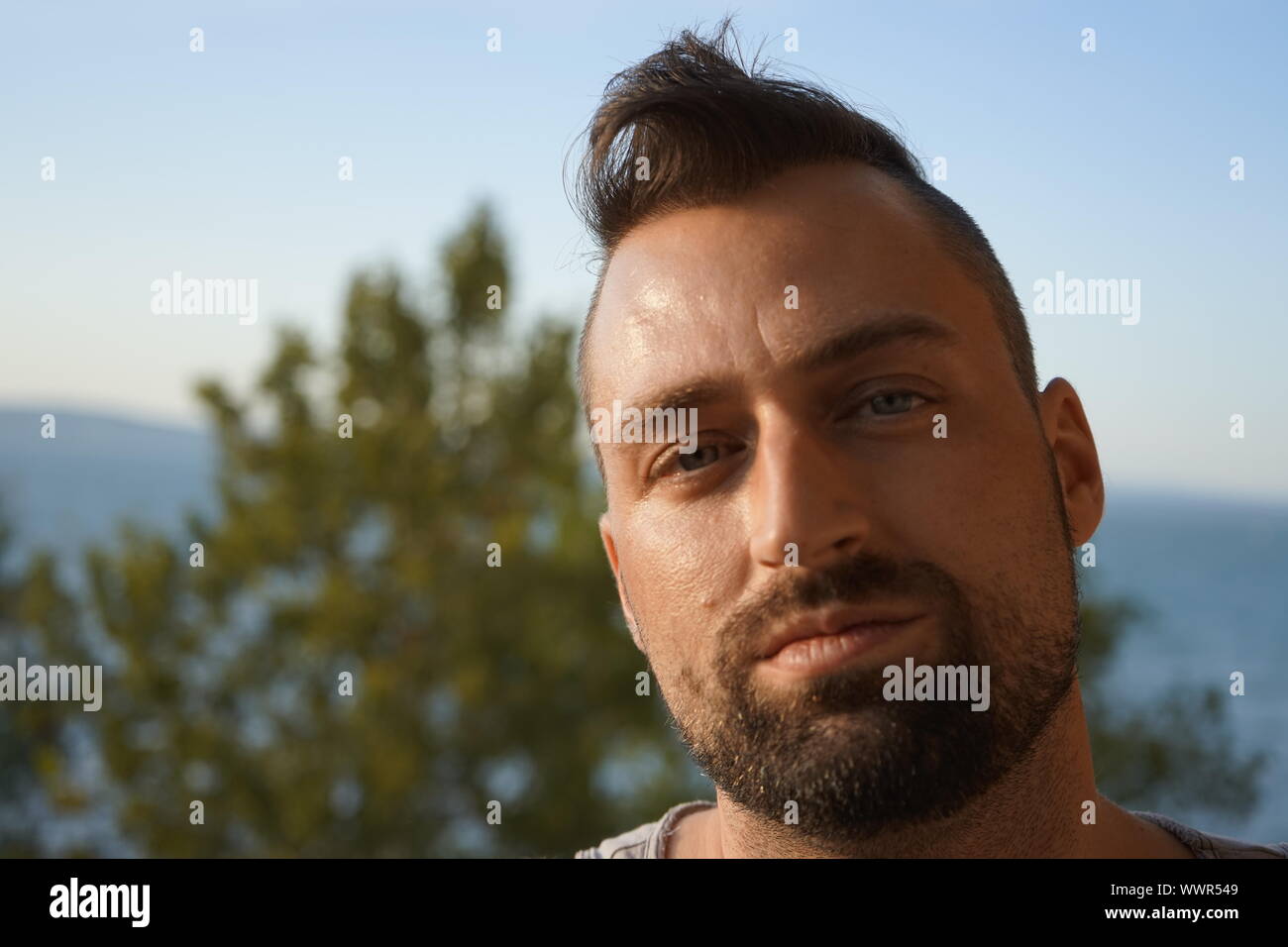 Male model images by a lake Stock Photo - Alamy