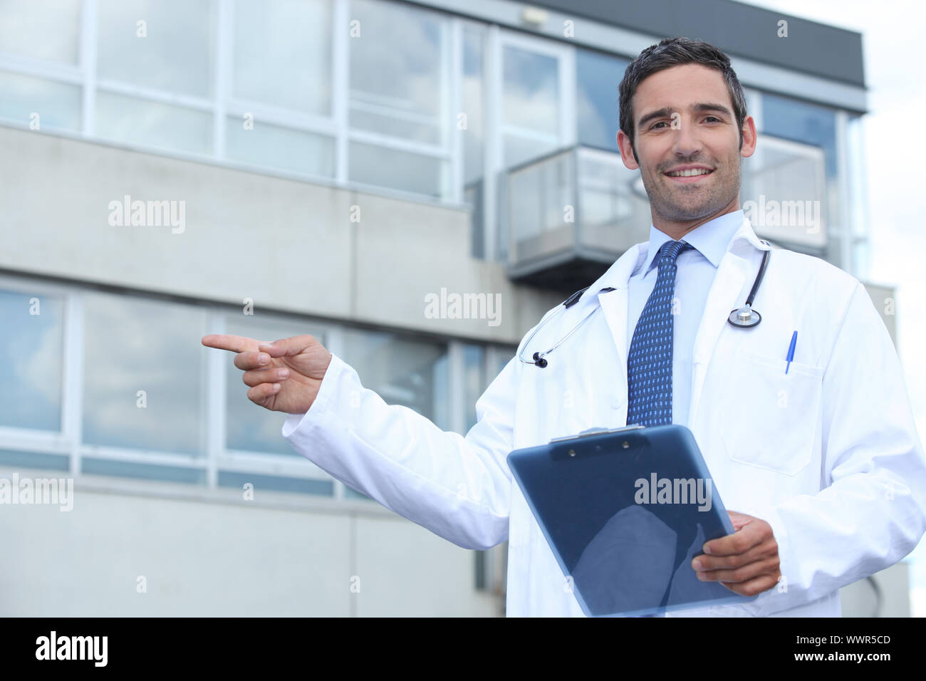 Doctor pointing outside hi-res stock photography and images - Alamy