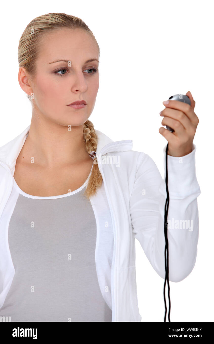 Young women with stop watch Stock Photo - Alamy