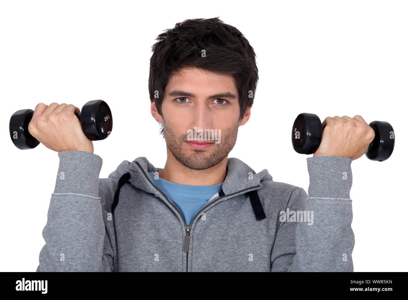 A man lifting weights Stock Photo - Alamy