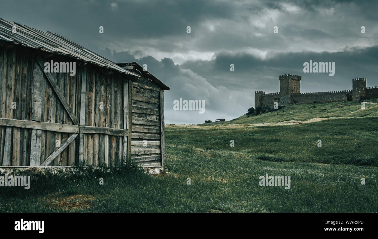 Old buildings under storm clouds Stock Photo - Alamy