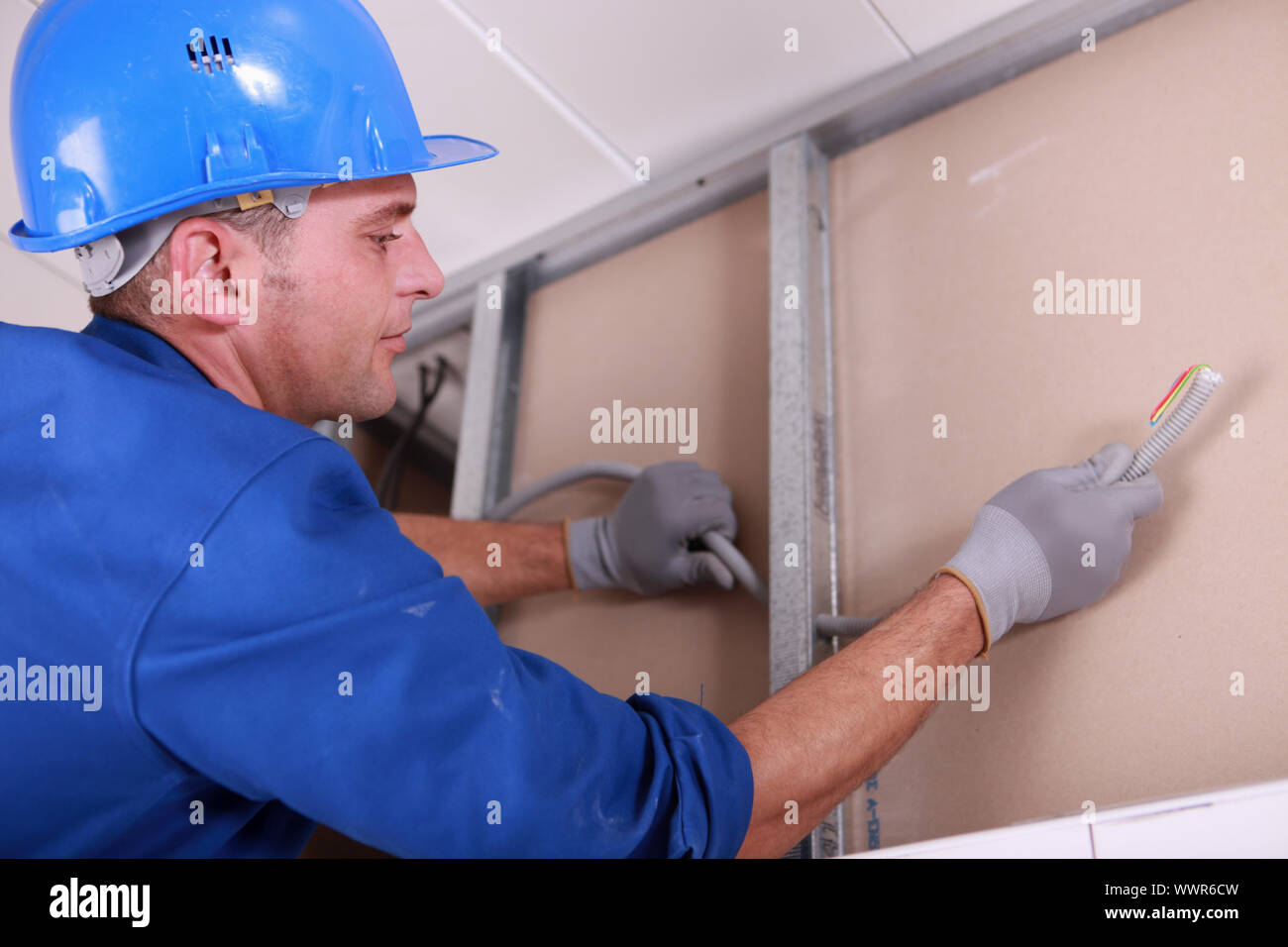worker fixing something Stock Photo - Alamy