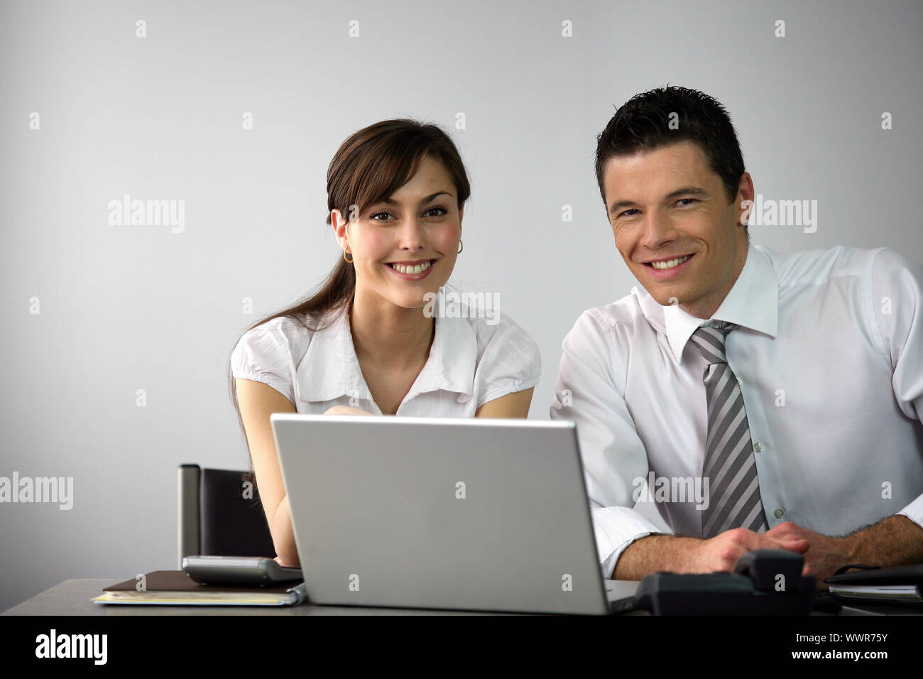 Businessman sat desk using laptop hi-res stock photography and images ...