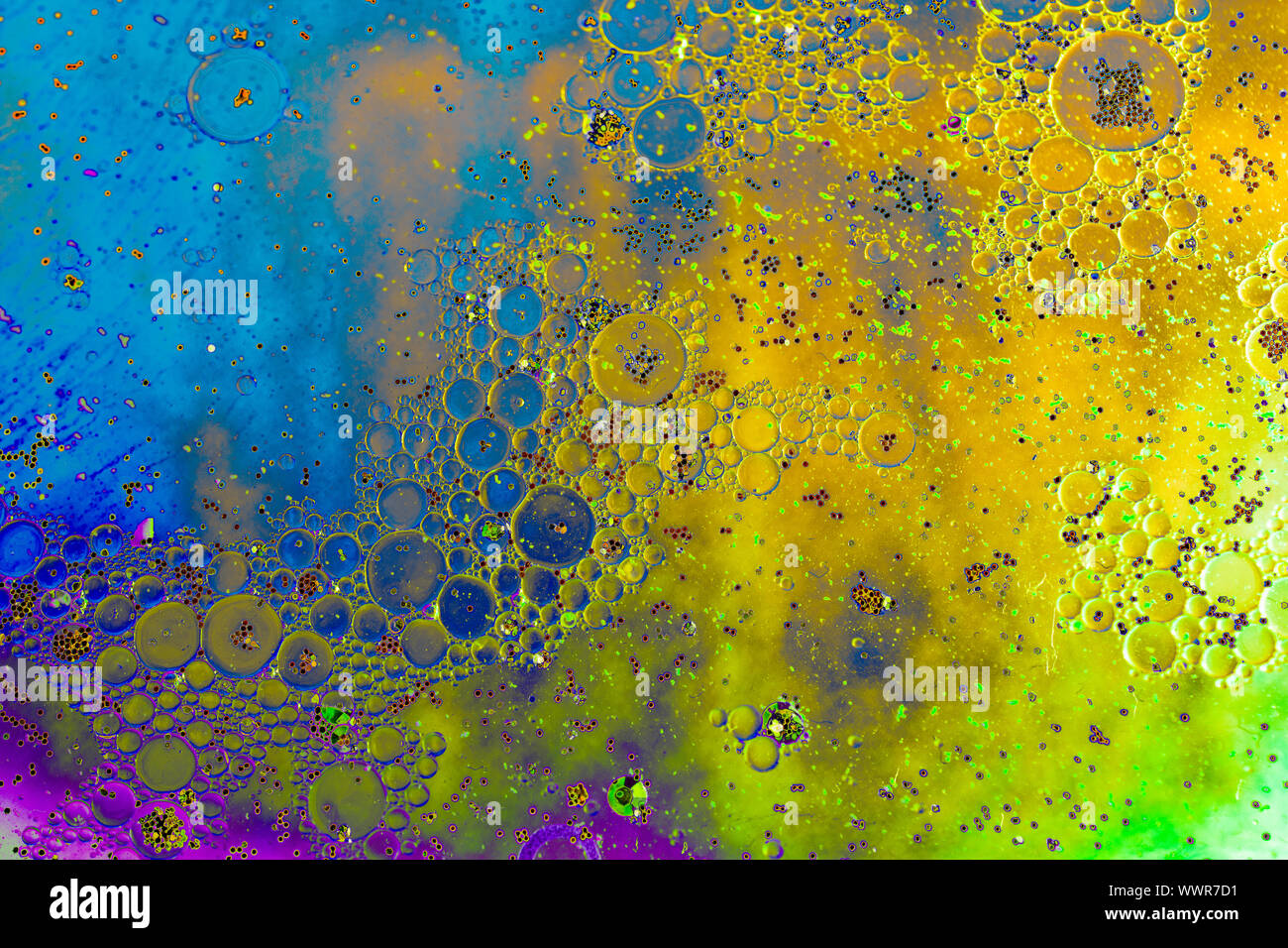 Oil bubbles inside water base form patterns Stock Photo - Alamy