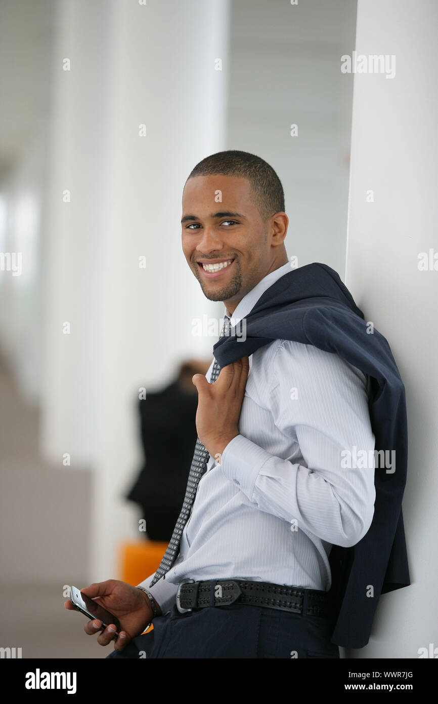 Businessman carrying jacket over shoulder hi-res stock photography and ...
