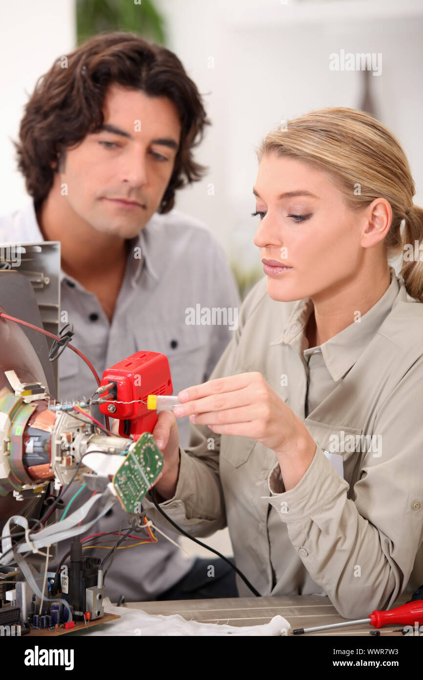 Technician repairing tv set hi-res stock photography and images - Alamy