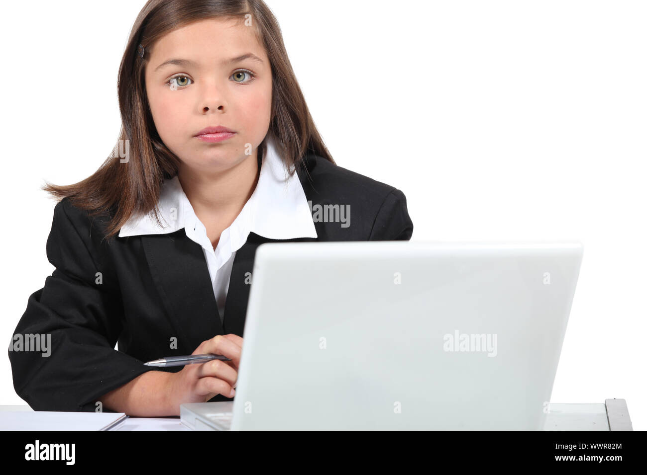 Little girl dressed as business worker Stock Photo - Alamy