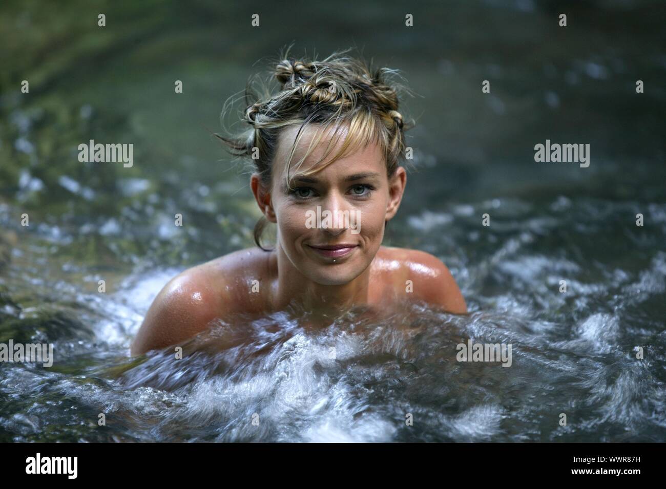 Woman in a jacuzzi Stock Photo - Alamy