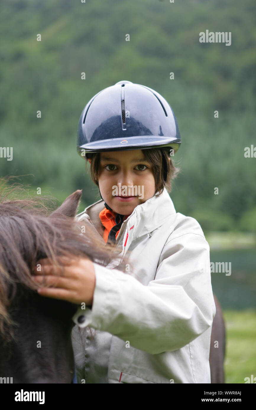 Child with a pony Stock Photo - Alamy