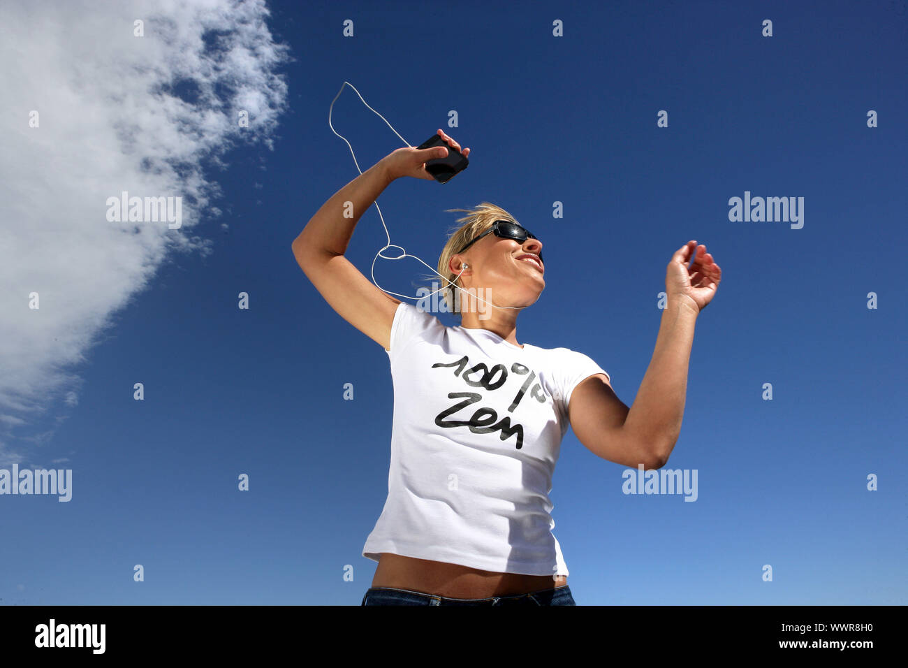 Woman dancing outdoors Stock Photo - Alamy