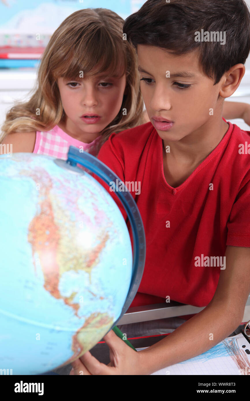 Two children in classroom Stock Photo - Alamy