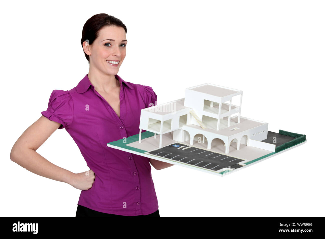 woman holding a model of a building Stock Photo - Alamy