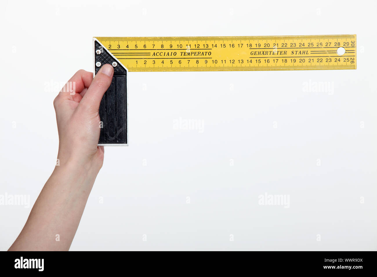 Hand holding square set Stock Photo - Alamy