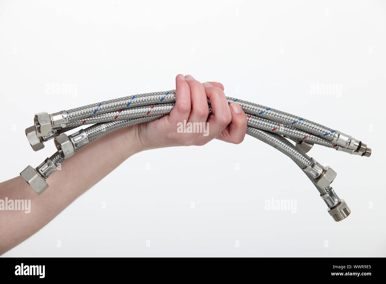 Holding pipe fittings hi-res stock photography and images - Alamy