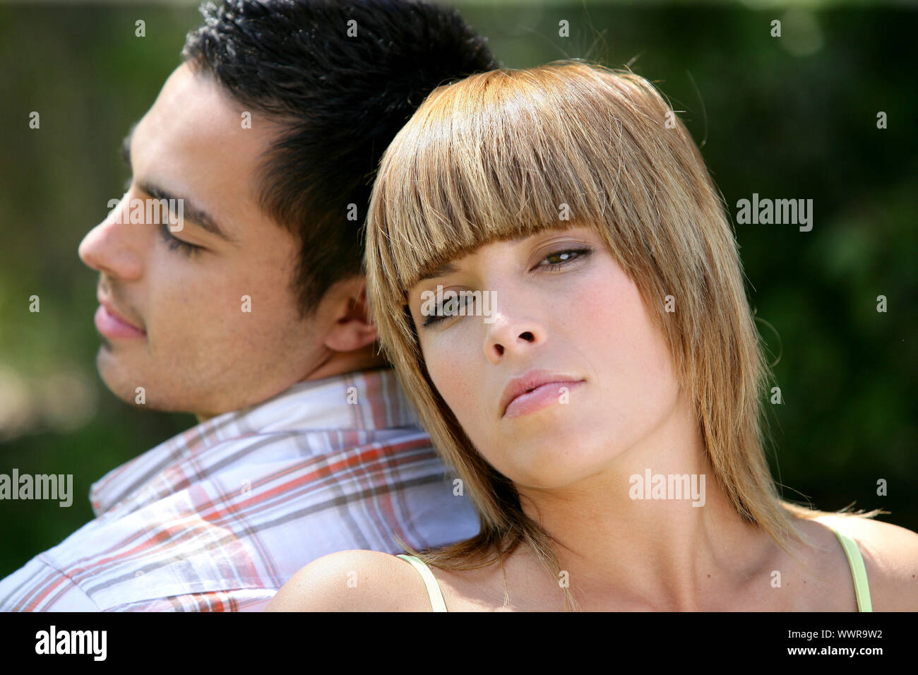 man and woman back to back Stock Photo - Alamy