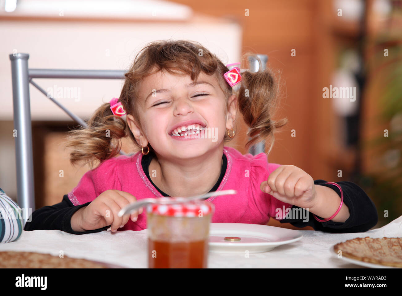 Adorable and playful little girl Stock Photo - Alamy