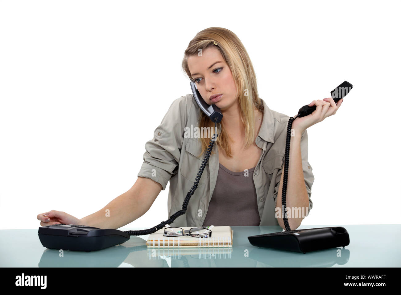Overworked office receptionist hi-res stock photography and images - Alamy
