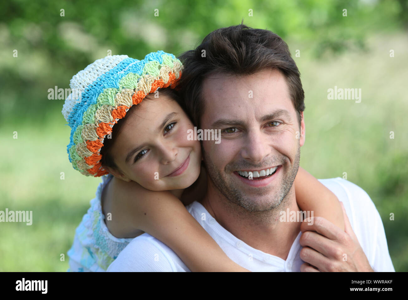Daughter on Father's back Stock Photo - Alamy