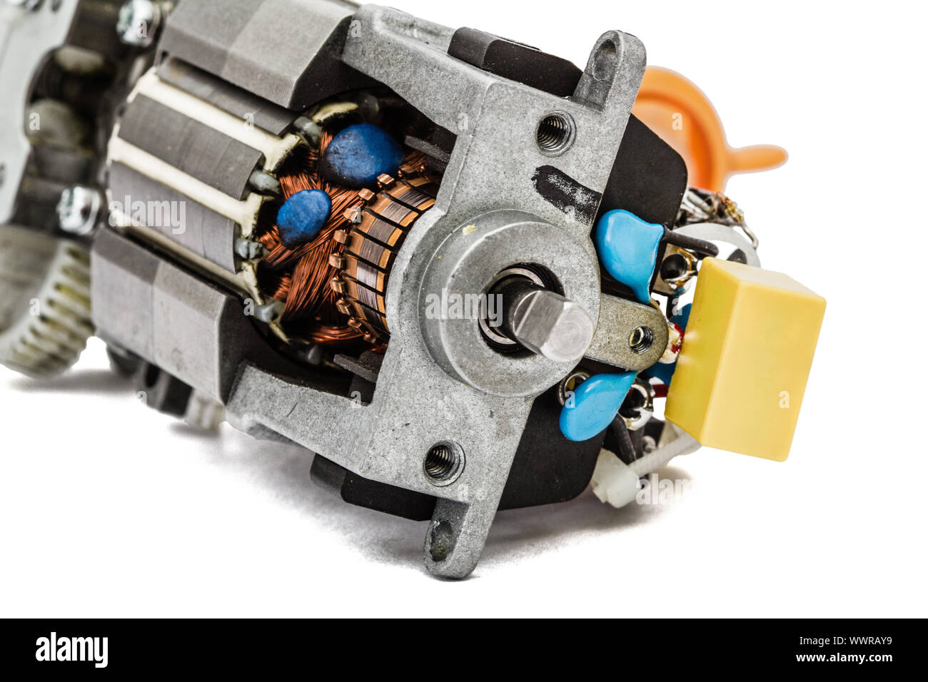 Part of small electric motor, close-up, isolated on white background ...