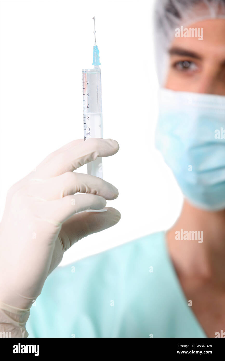 Nurse holding injection Stock Photo - Alamy